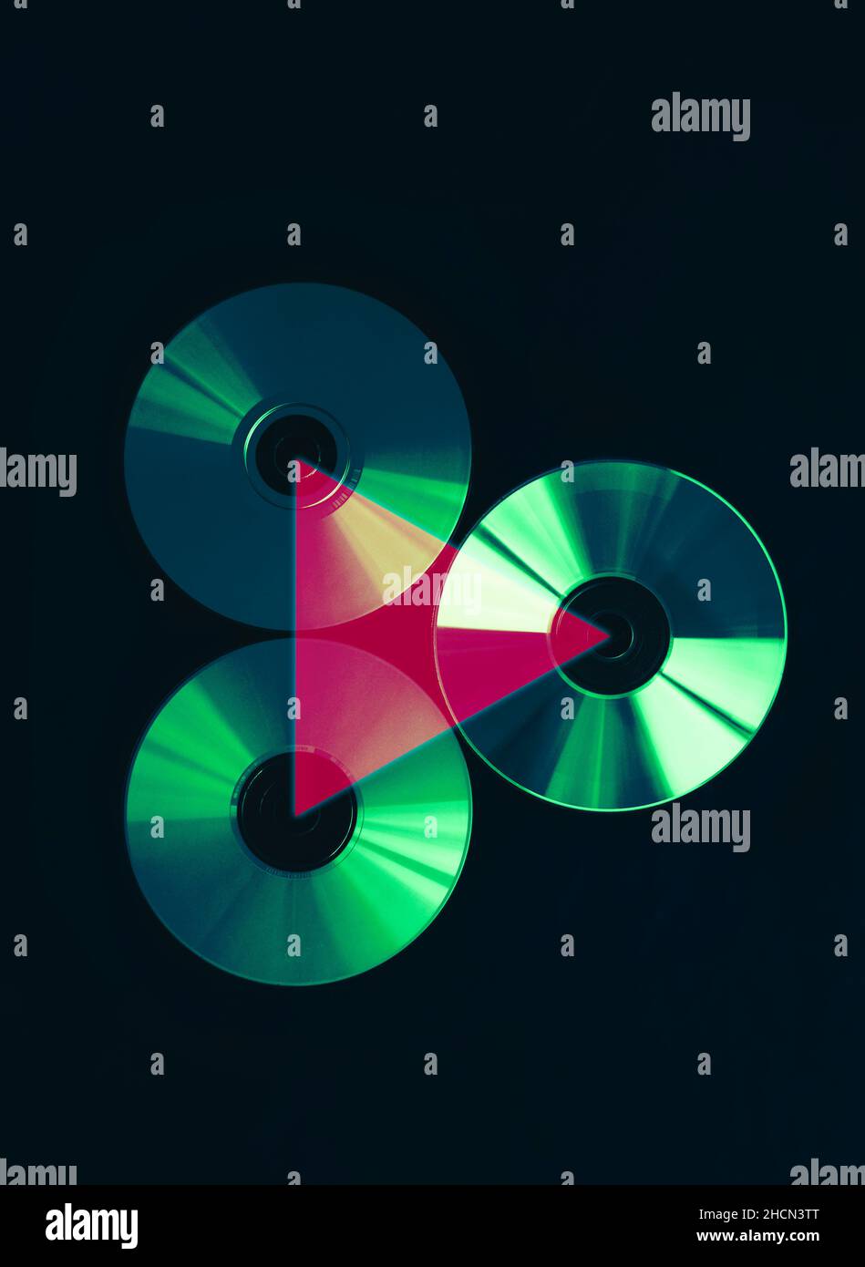 Three digital discs connected together by a graphical pink play icon ...