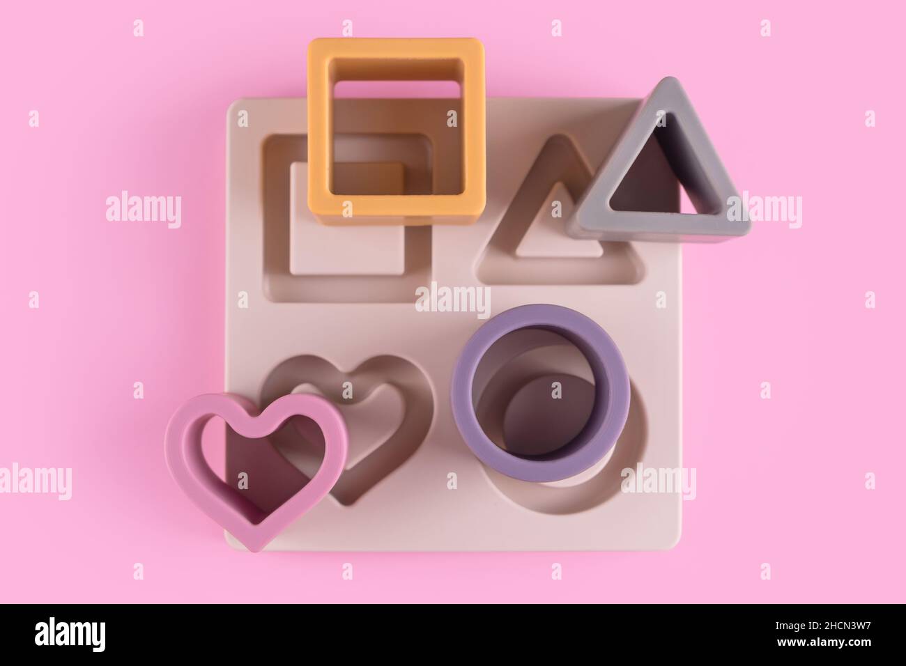 Baby soft nesting sorting ans stacking toy for arranging by color and geometric shape. Silicone ...