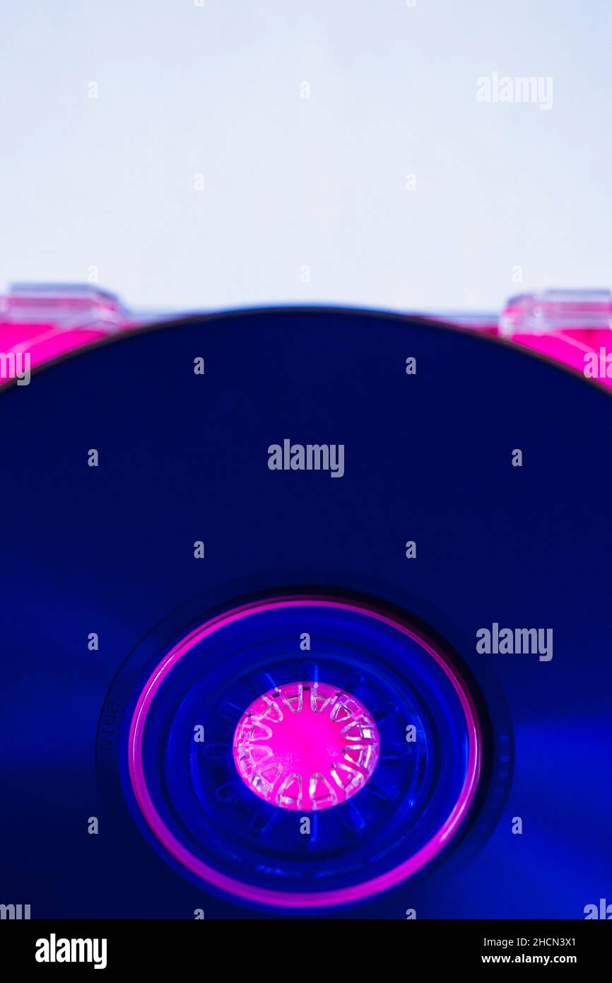 Coloured CD in tray holder against wavy white background Stock Photo ...