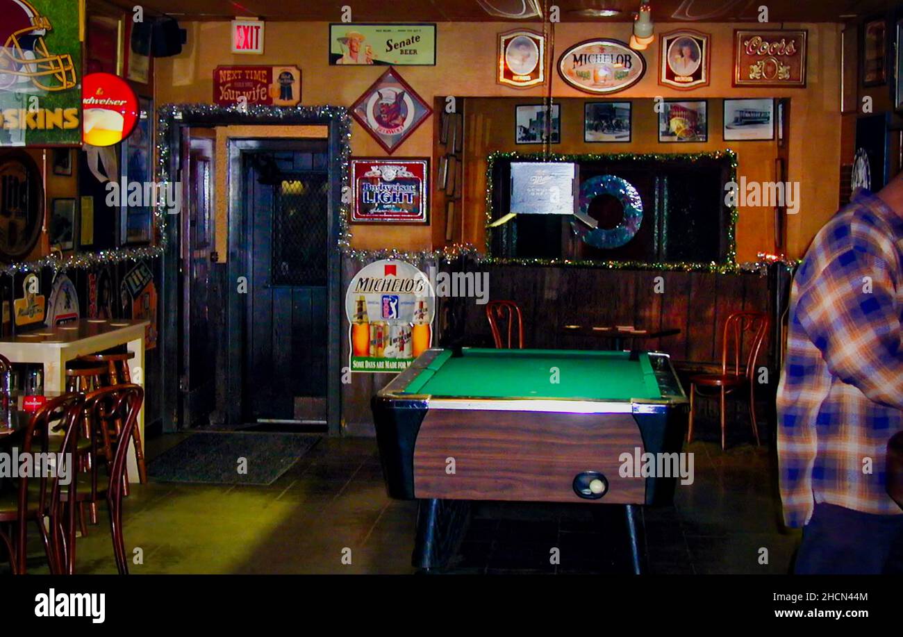Pool table in an old time neighborhood bar Stock Photo - Alamy
