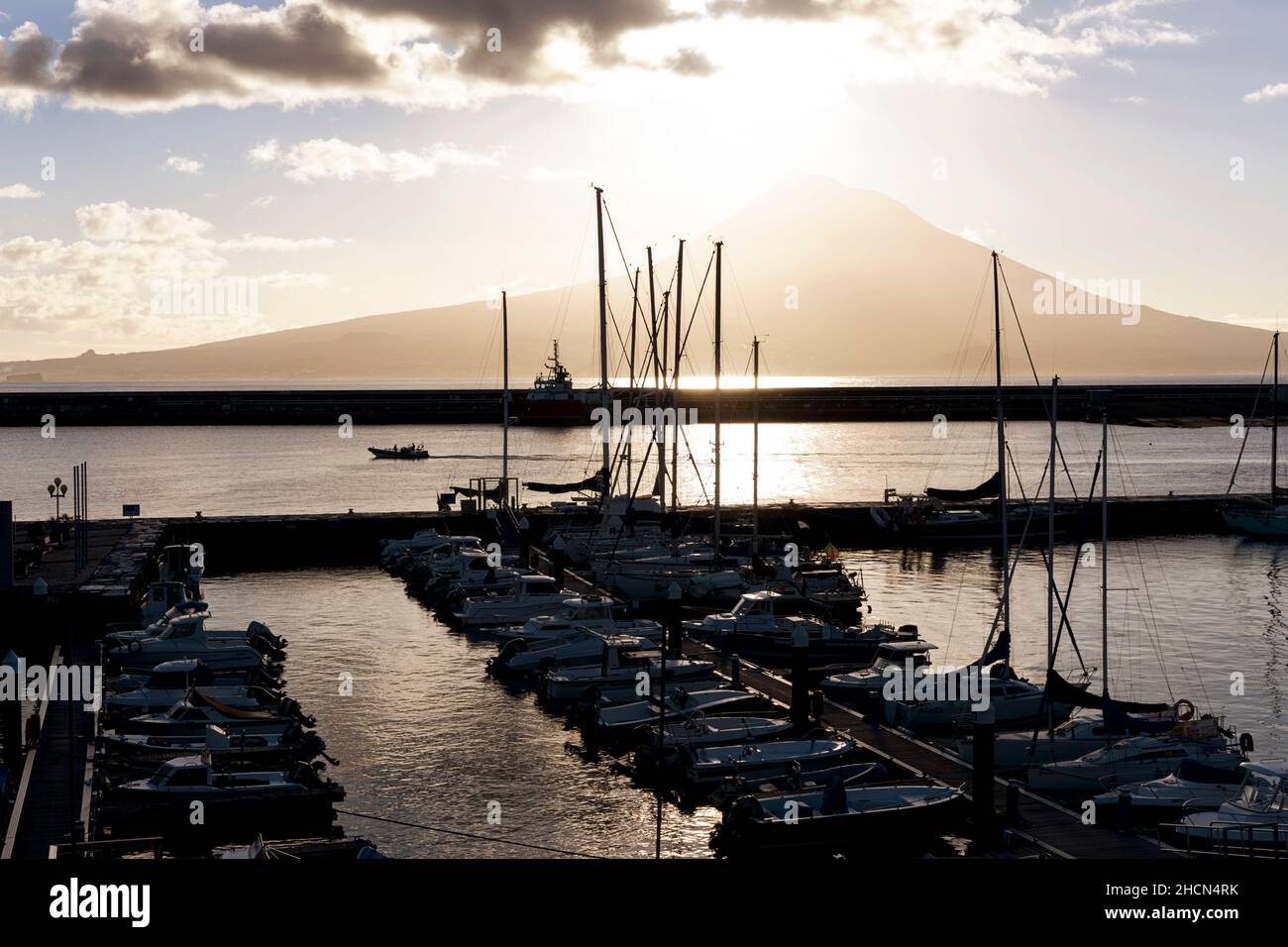 Sunset at Marina of Horta, with beautiful view of Pico volcano, . Faial ...