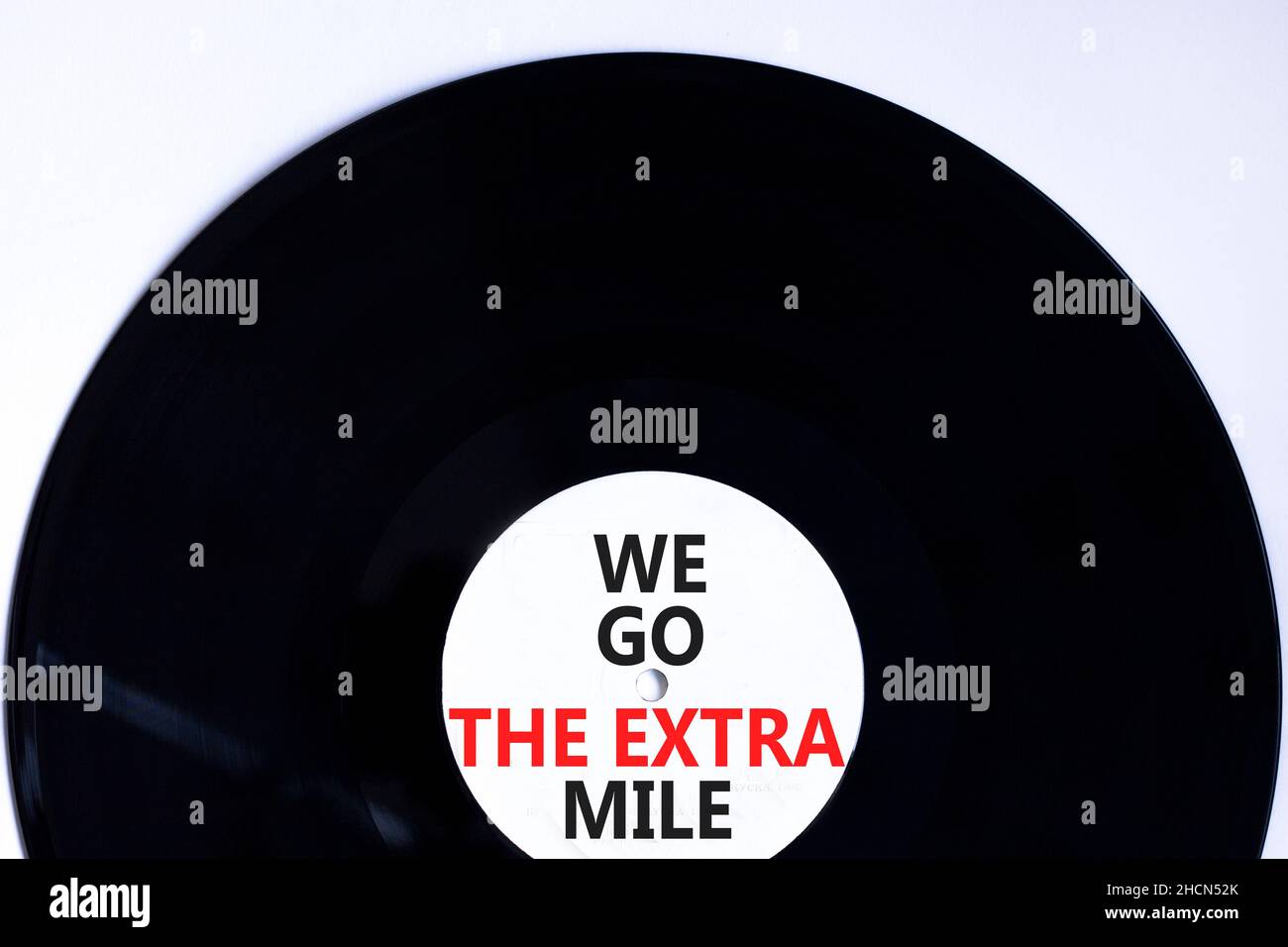We go the extra mile symbol. Concept words We go the extra mile on ...