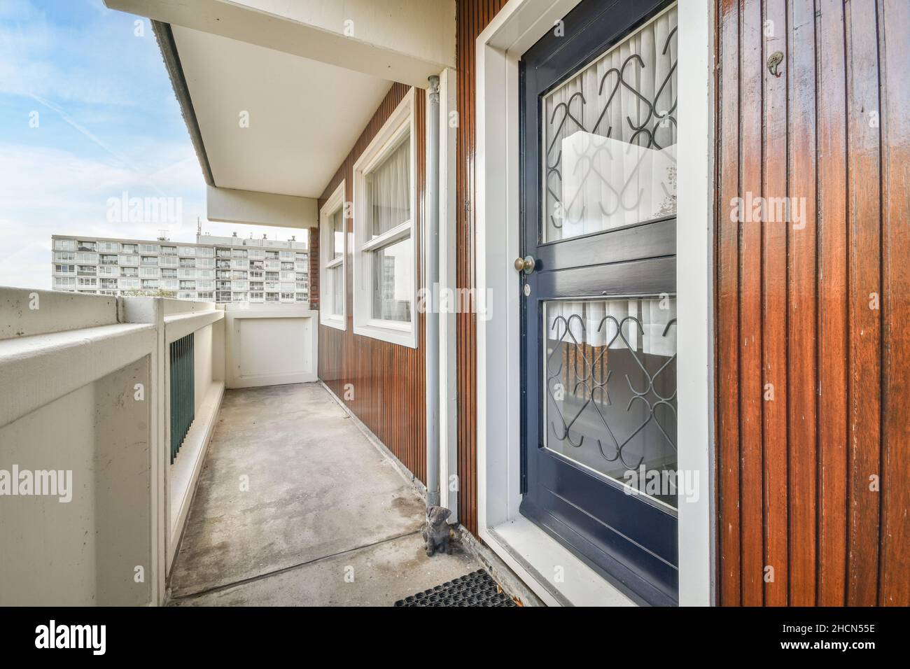 Balcony of a beautiful house in the daytime Stock Photo - Alamy