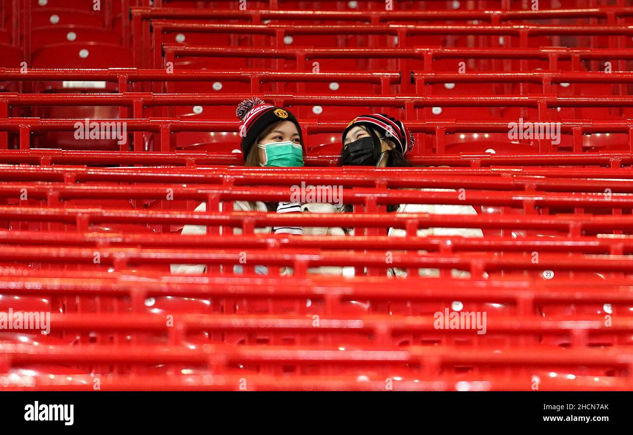Manchester United fans in the stands wearing face masks before the ...