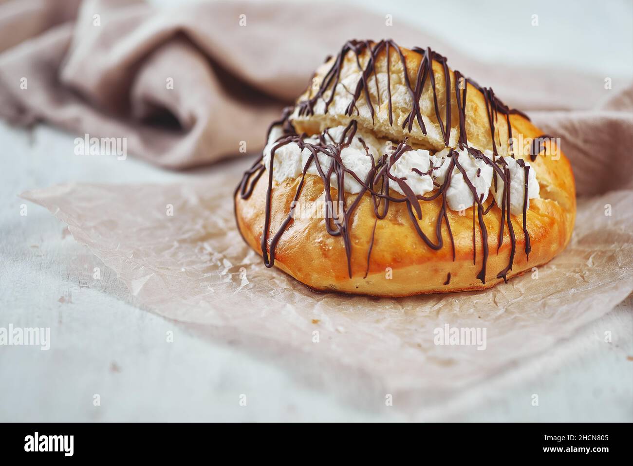 cream puffs. homemade pastry cream puff on a table Stock Photo - Alamy