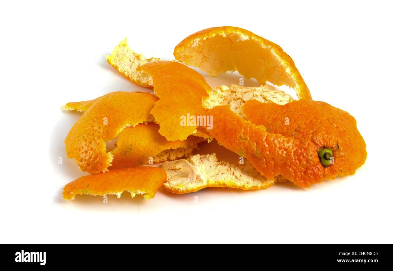 Tangerine skin isolated on white background. Remains of peeled citrus ...