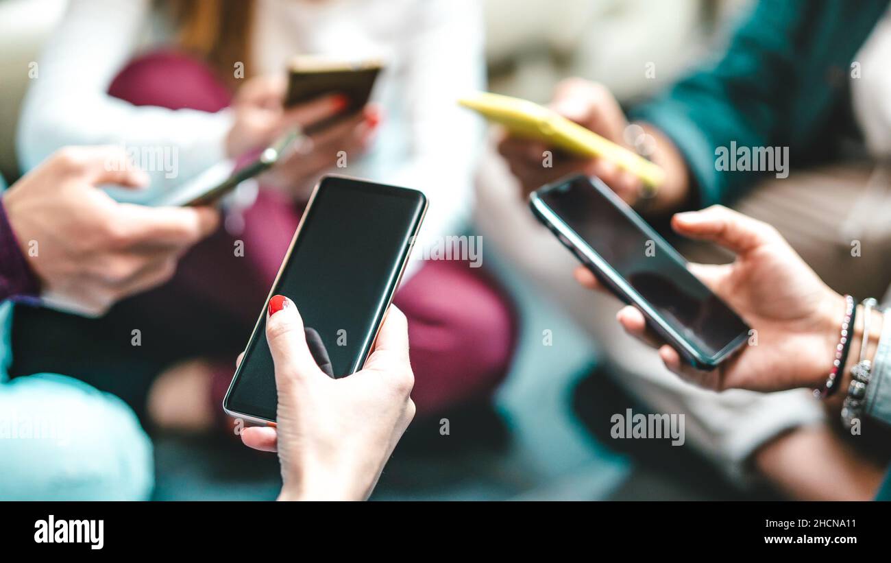 Closeup of blogger hands using data on mobile smartphones - Detail of ...