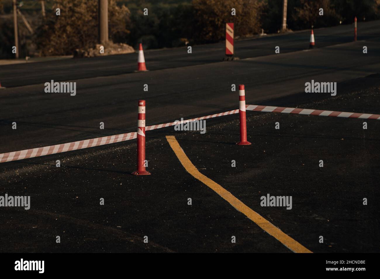 Temporary roadblocks, road repair, road construction. the new road is ...