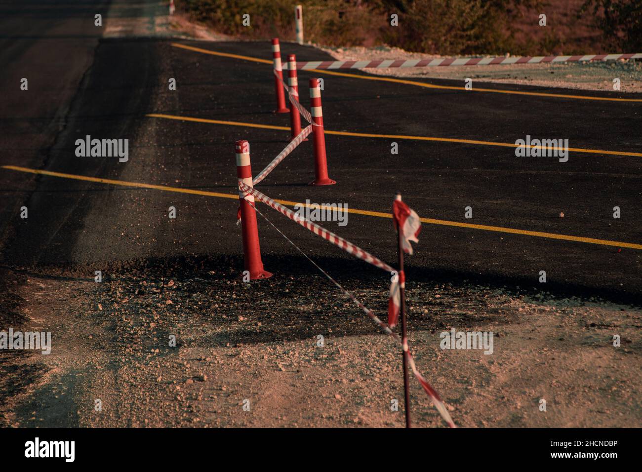 Temporary roadblocks, road repair, road construction. the new road is ...