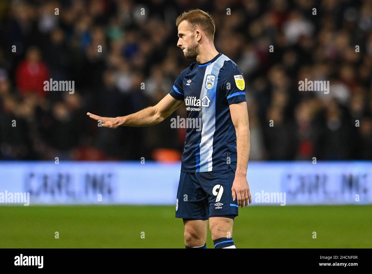 Jordan Rhodes #9 of Huddersfield Town gives his team instructions Stock ...