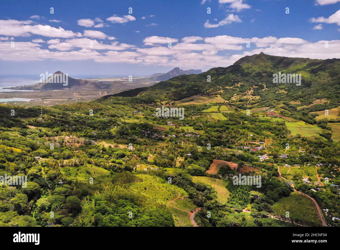 Bird's-eye view of the mountains and fields of the island of Mauritius ...