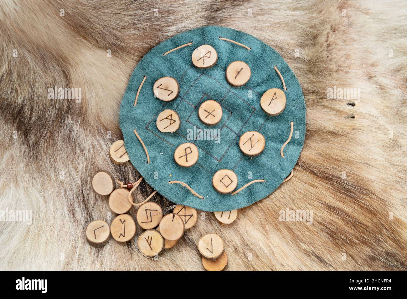 Handmade runes for fortunetelling Stock Photo - Alamy