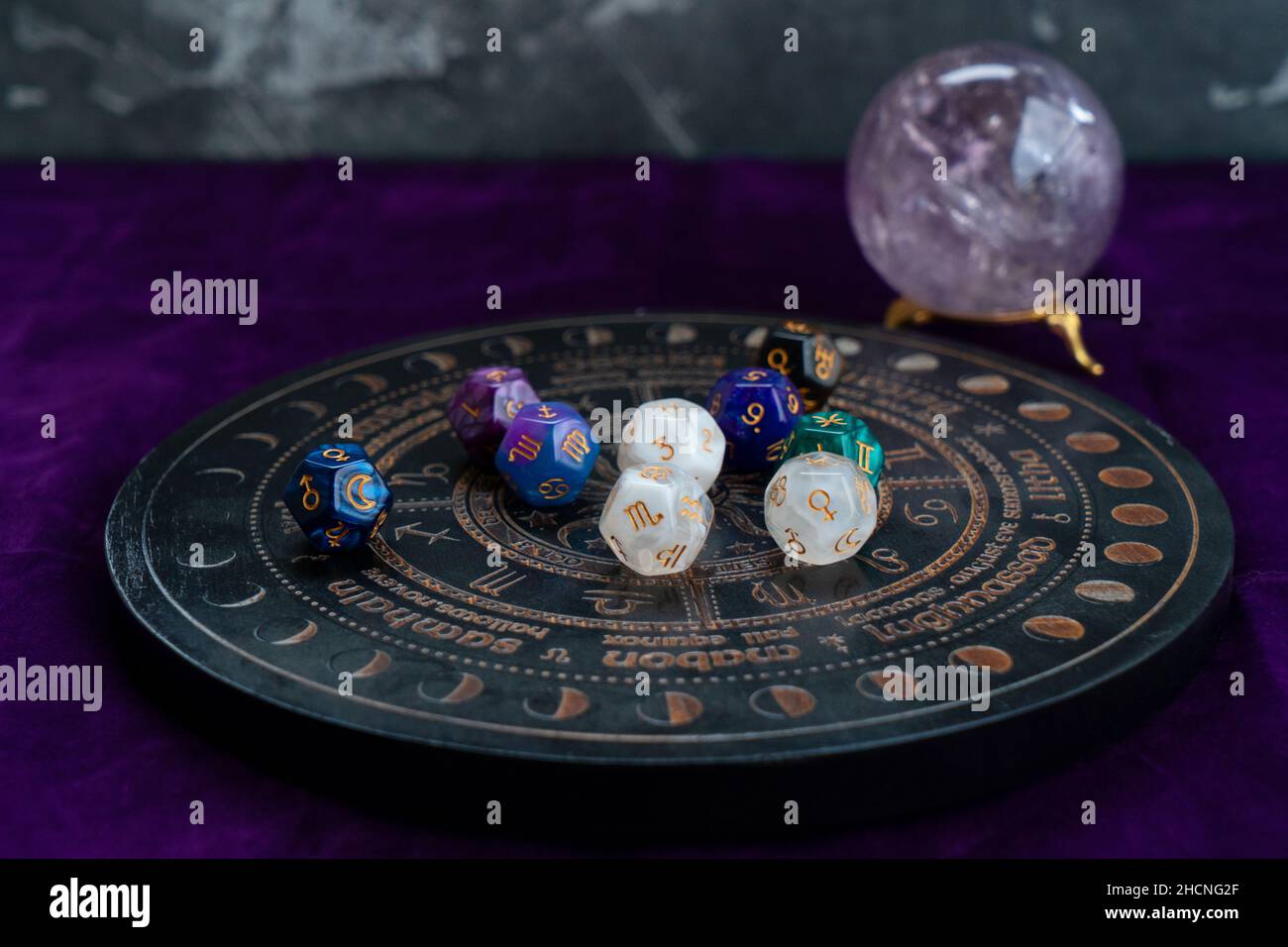Zodiac horoscope with divination dice Stock Photo - Alamy