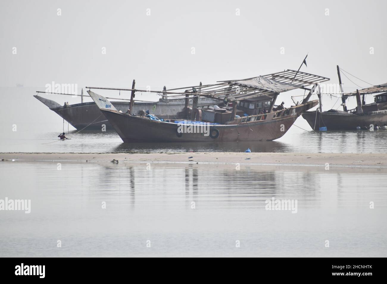 Old damaged wrecked ships in the sea Stock Photo - Alamy