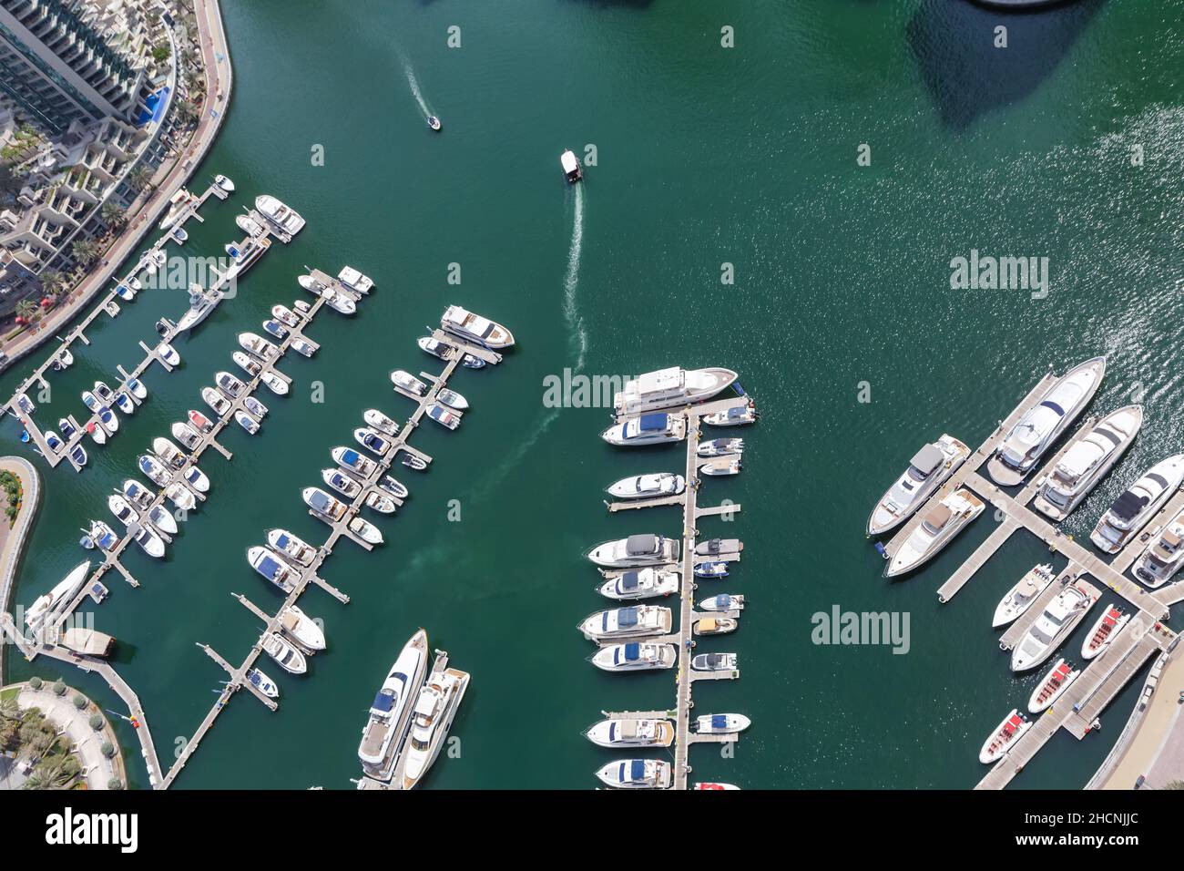 Dubai Marina and Harbour luxury wealth travel with boats yacht in ...