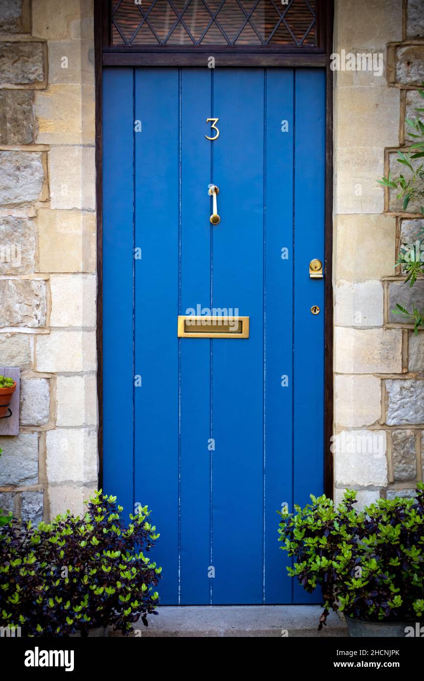 House number 3 on a blue front door on an old cottage Stock Photo - Alamy