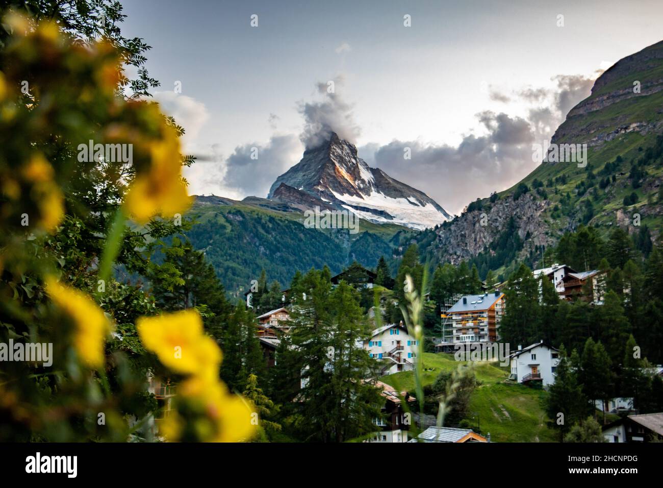 Scenic view of The Matterhorn peak from Zermatt village, with colorful ...