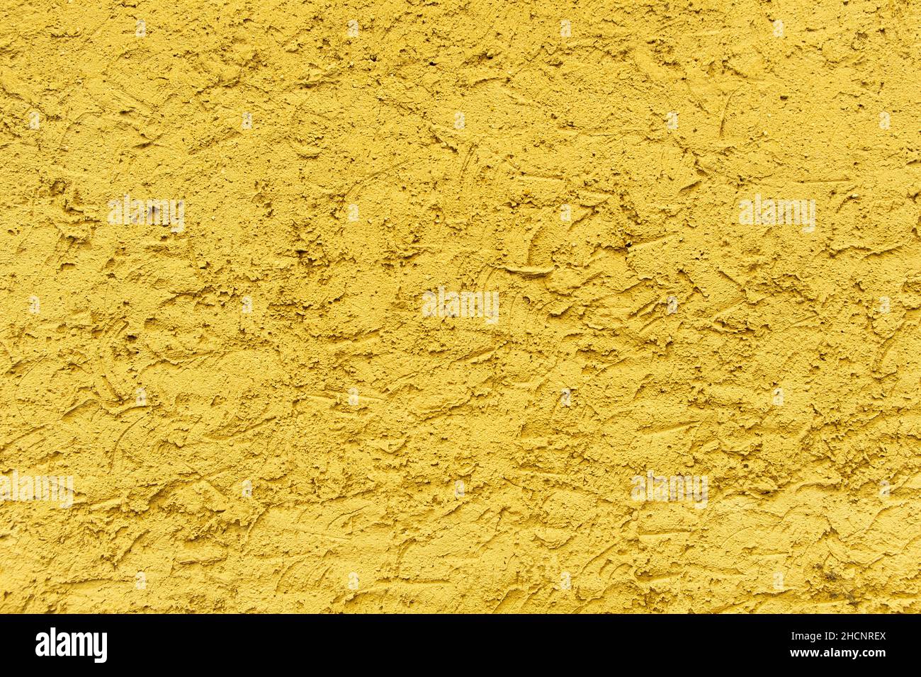 Rough version of Yellow plaster. Textured wall background Stock Photo ...