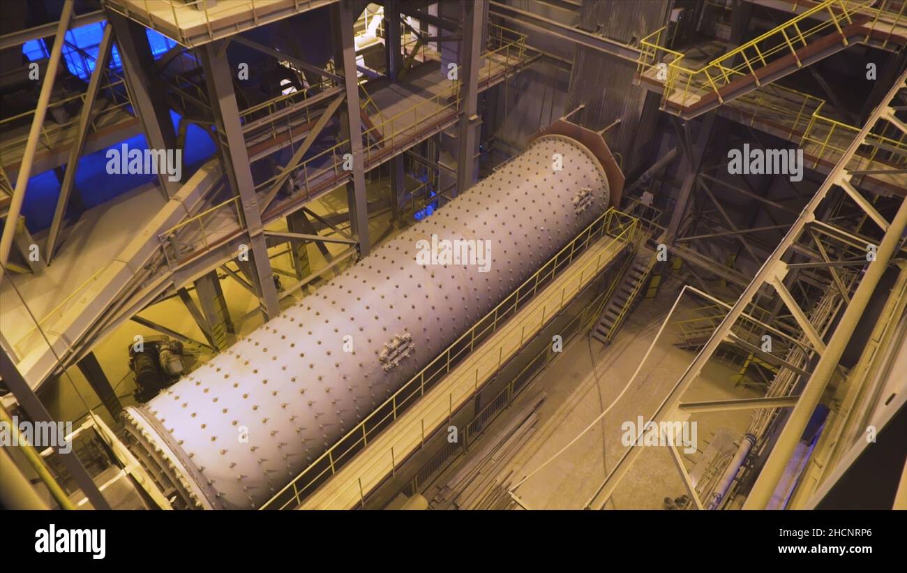 Ore dressing mill or factory grinder. View inside of the workshop with ...
