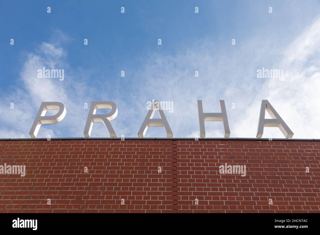 Big letters praha Prague on the brick wall on bus hub Florenc. Czechia ...