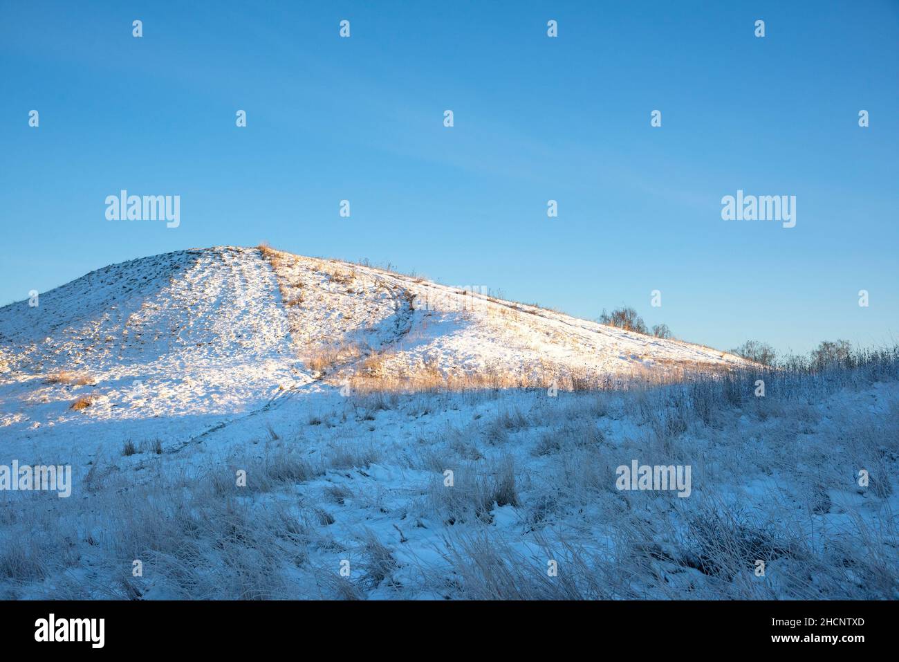Royal Mounds in Old Uppsala covered in snow Stock Photo - Alamy