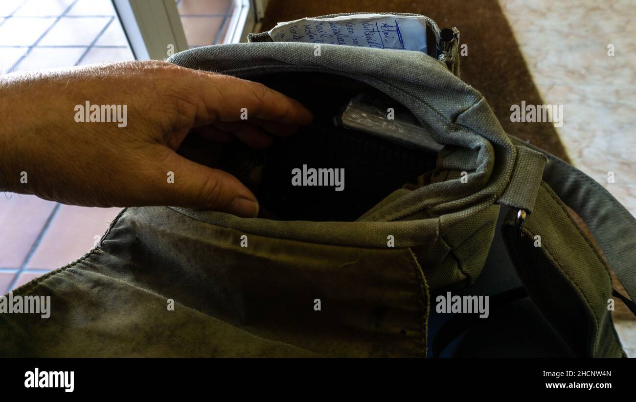 hand in the bag Stock Photo - Alamy