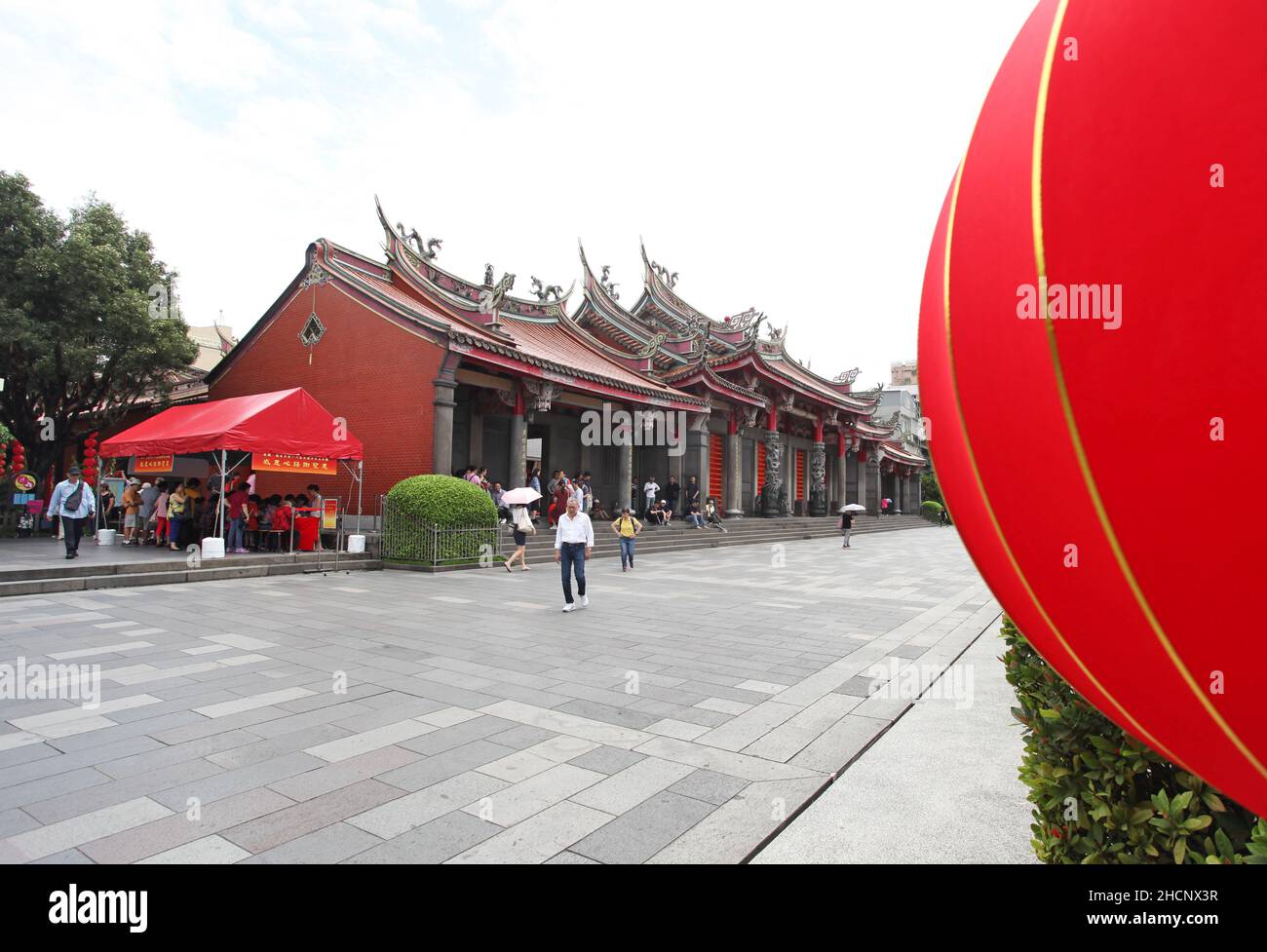 The Xingtian Temple with visitors. The temple is a contemporary temple ...
