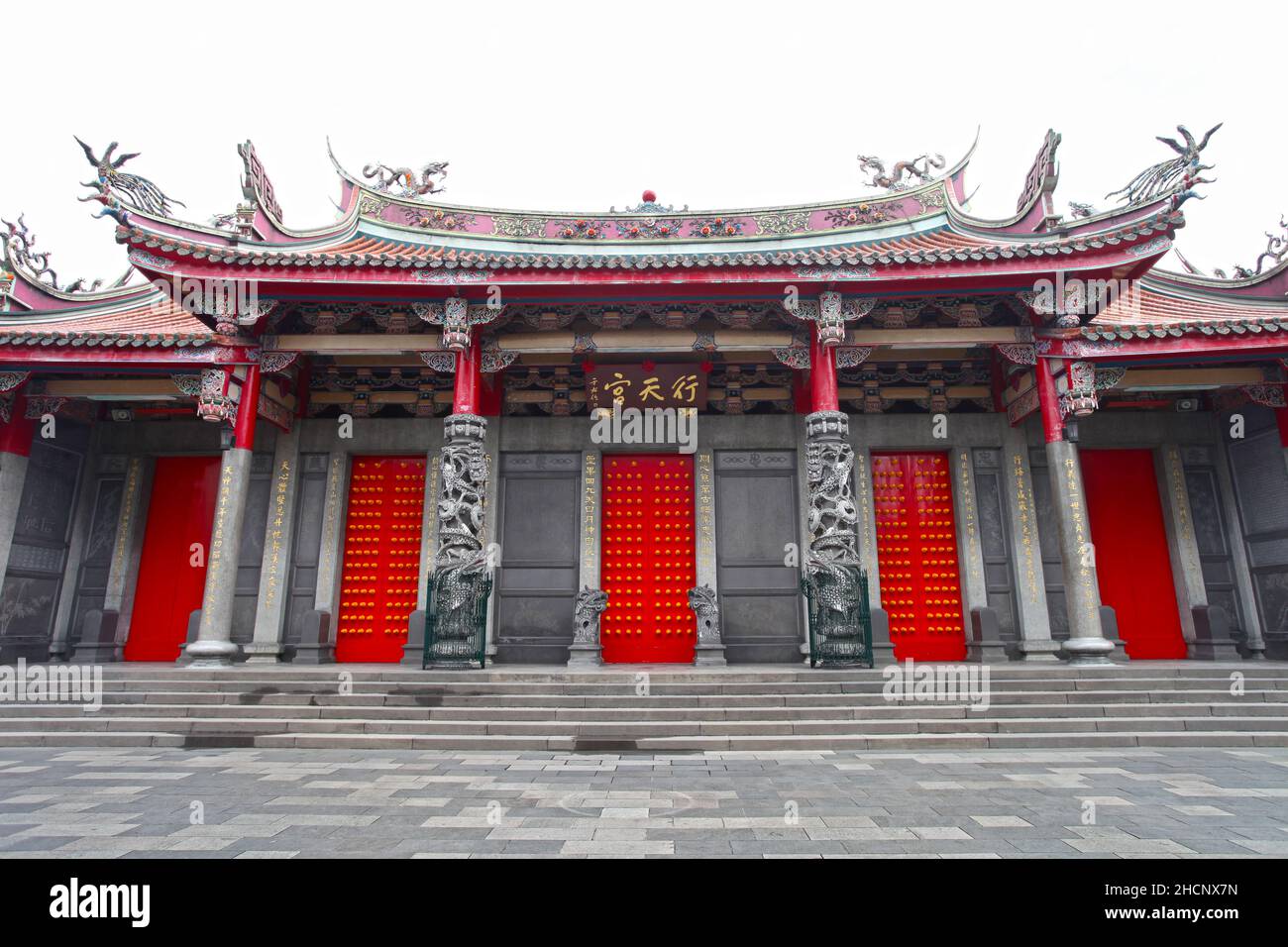 The huge red doors of the Xingtian Temple. The temple is a contemporary ...