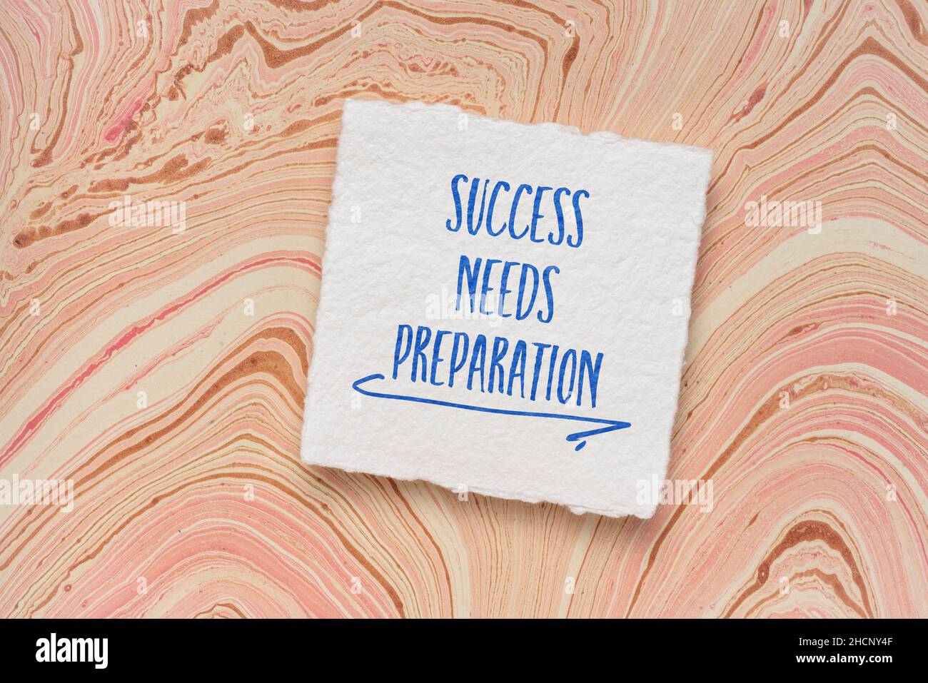 Success needs preparation motivational note, handwriting on a handmade ...
