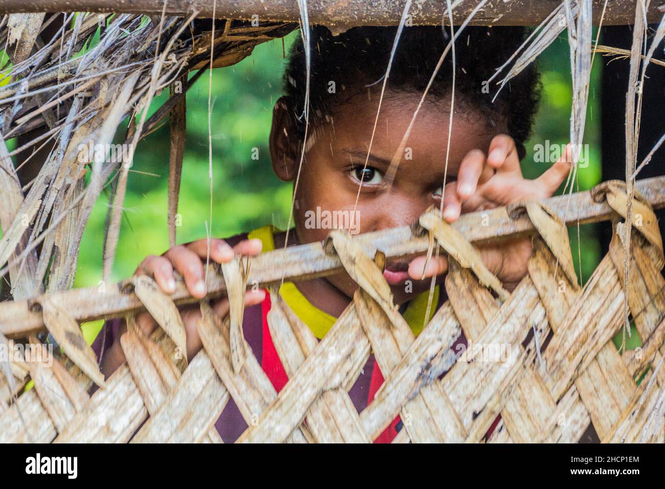 TAMAN NEGARA, MALAYSIA - MARCH 17, 2018: Indigenous baby in a village ...