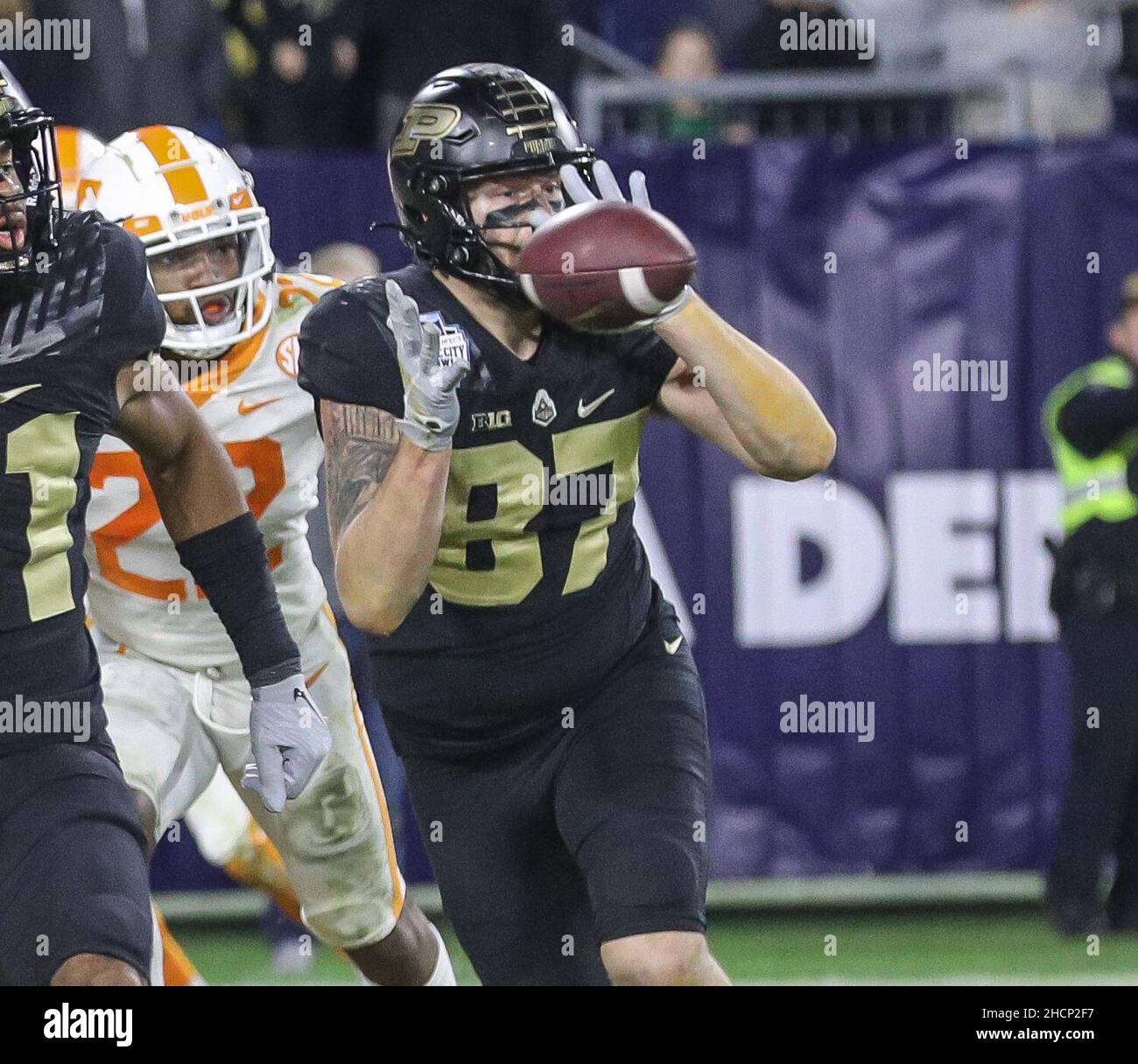 Nashville, TN, USA. 30th Dec, 2021. Purdue's Payne Durham #87 catches a ...