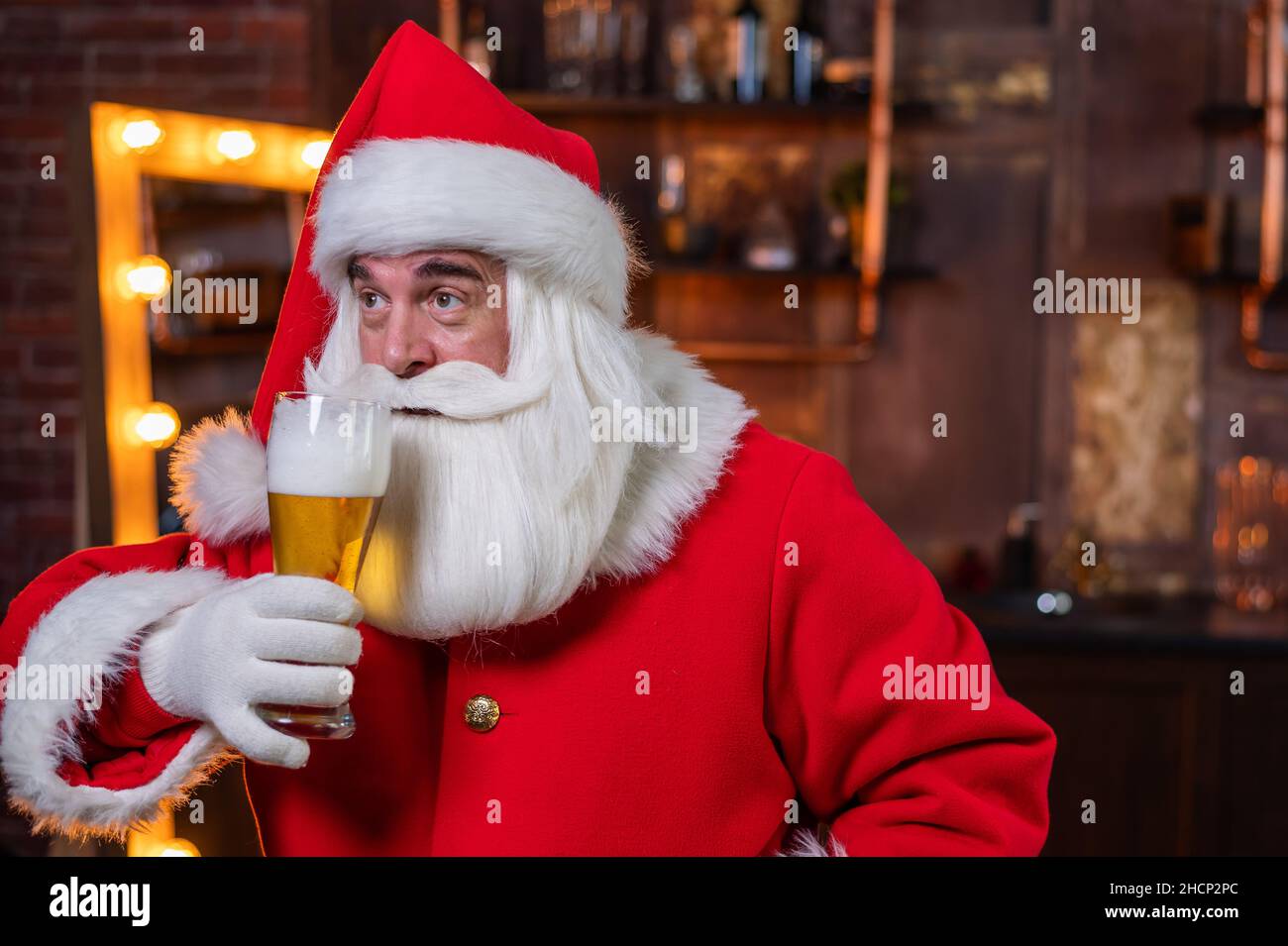 Santa claus drinking beer hi-res stock photography and images - Alamy