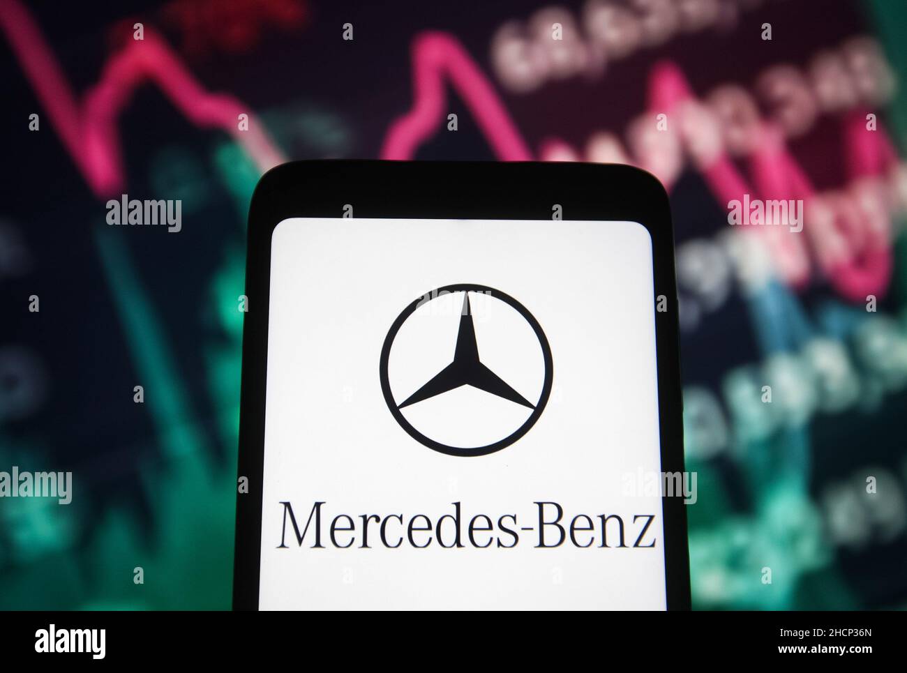 In this photo illustration, a Mercedes-Benz AG logo is seen on a ...