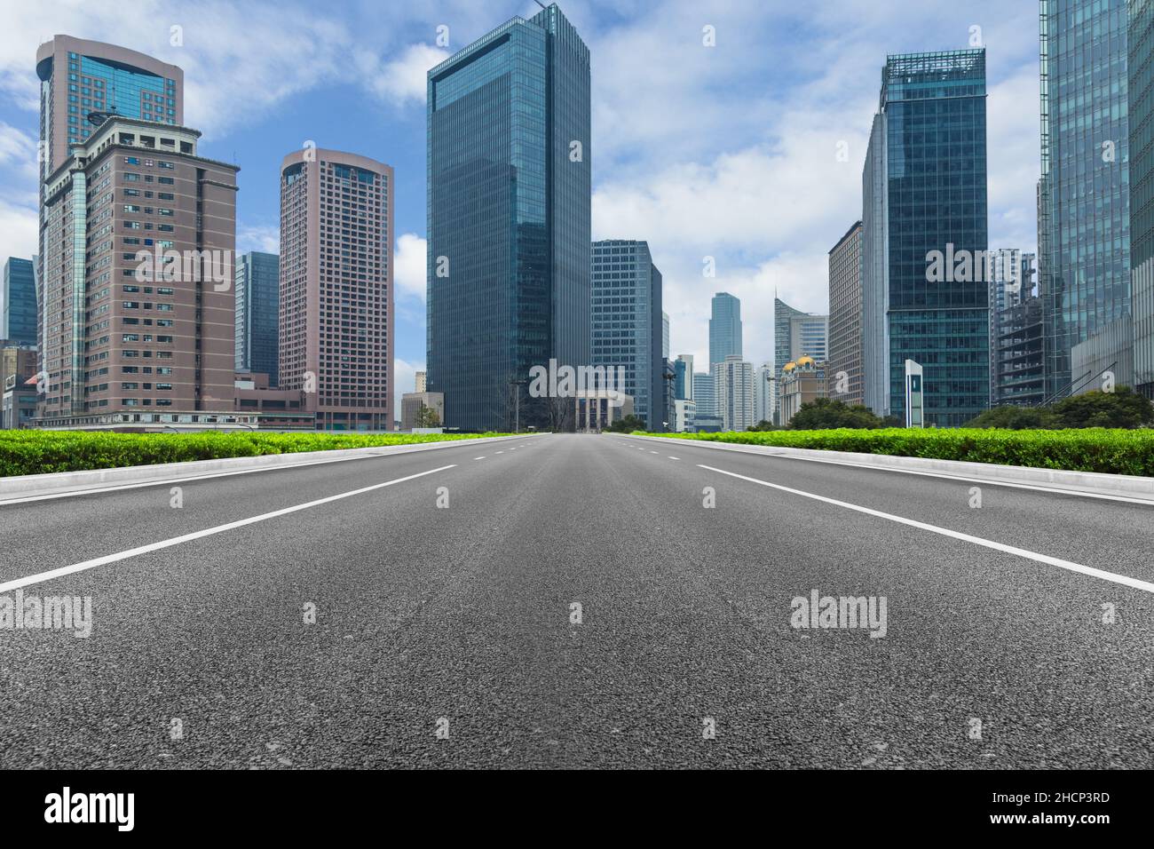 city road through modern buildings in shanghai Stock Photo - Alamy