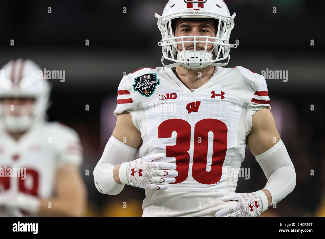 December 30, 2021: Wisconsin Badgers safety Tyler Mais (30) runs onto ...