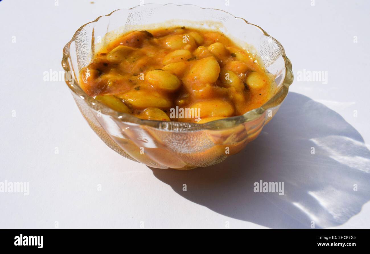Delicious Vaal nu shaak or Butter beans curry served in transparent ...