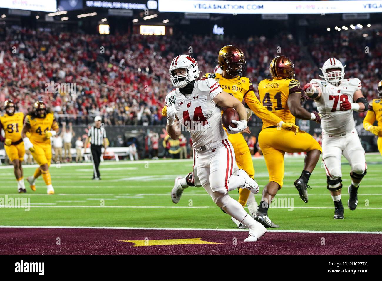 December 30, 2021: Wisconsin Badgers fullback John Chenal (44) scores a ...