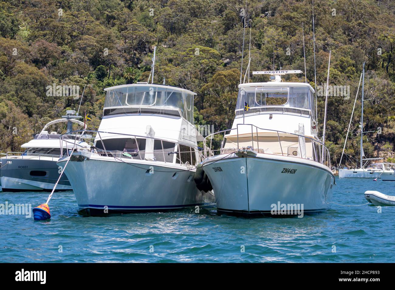 Riviera motor yacht boats rafted up at the Basin Coasters Retreat area ...