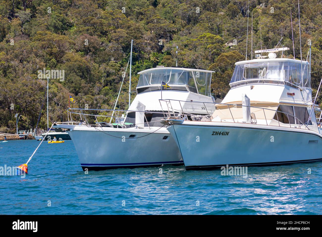 Coasters retreat on Pittwater in Sydney, two Riviera made flybridge ...