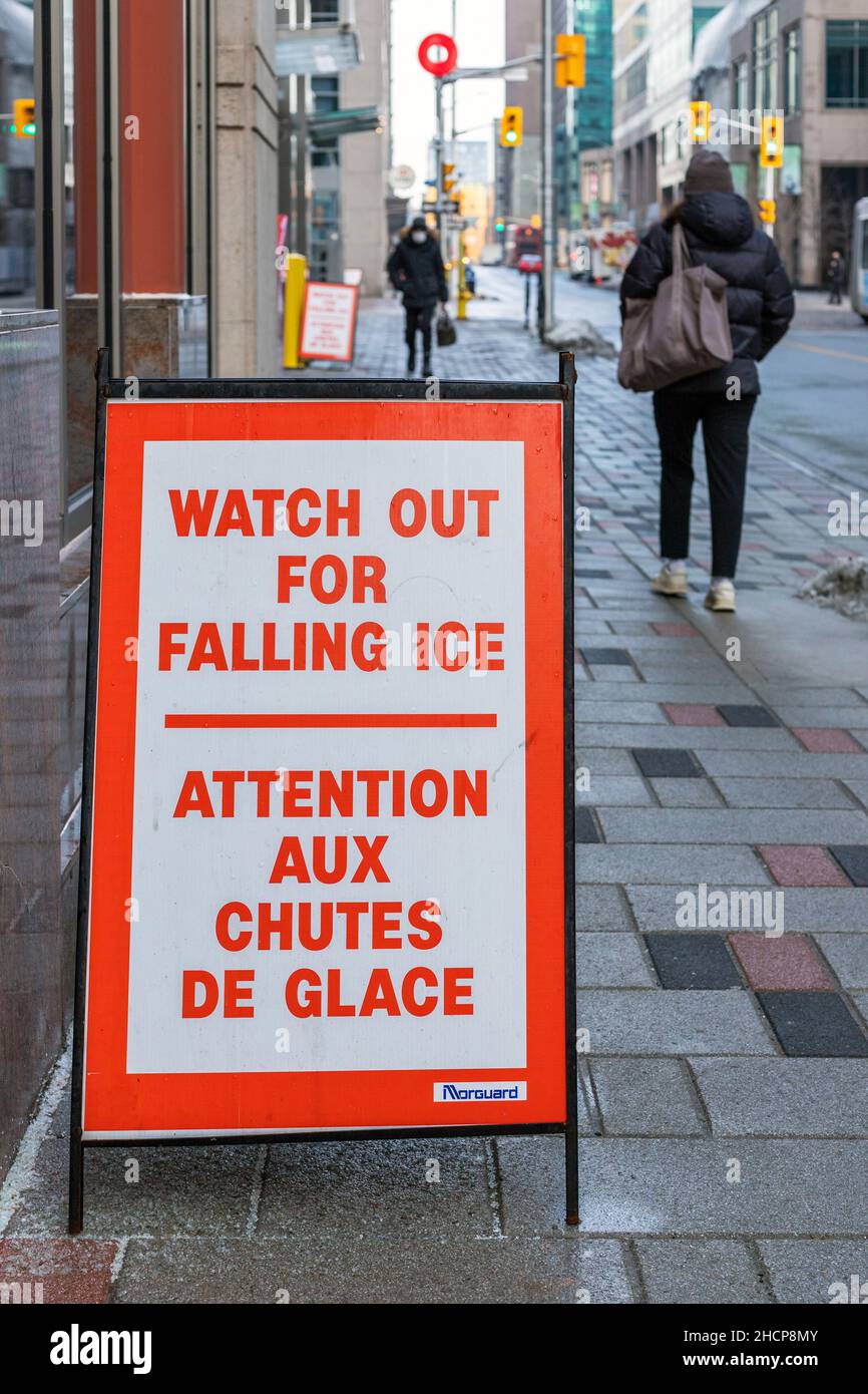 Ottawa, Canada - December 16, 2021: Sign on the sidewalk warning of the ...