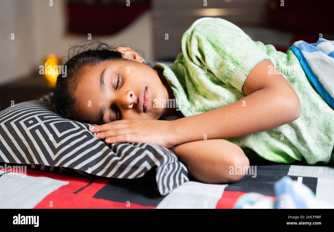 Child sleeping bed india hi-res stock photography and images - Alamy