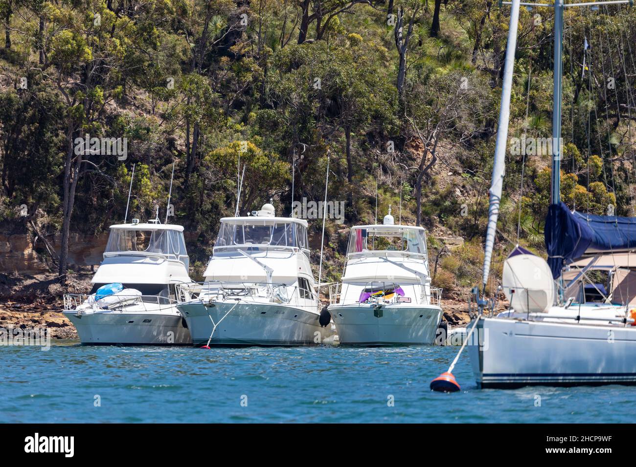 Riviera motor yacht boats rafted up at the Basin Coasters Retreat area ...