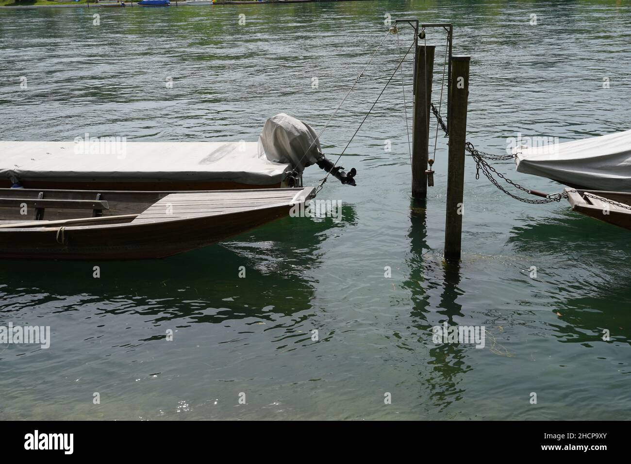 Wooden boats called Weidling in German language equipped with outboard ...