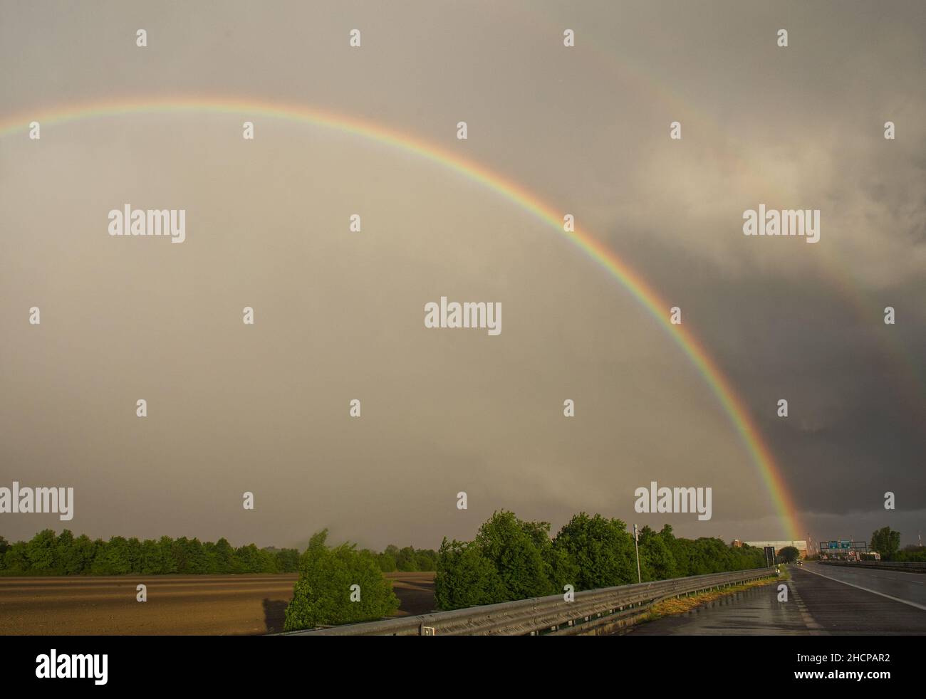 Rainbow after a strong thunderstorm Stock Photo - Alamy