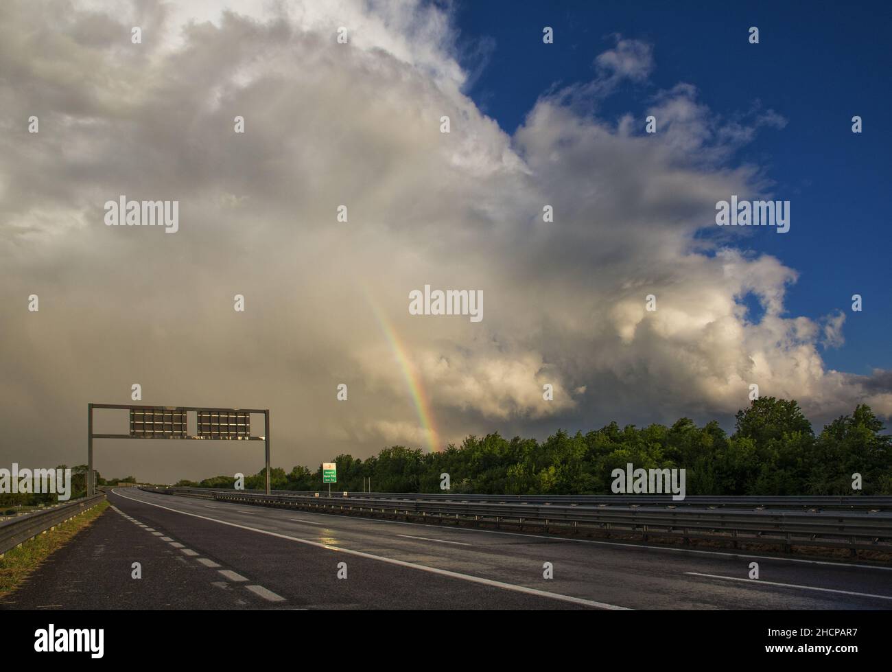 Rainbow after a strong thunderstorm Stock Photo - Alamy