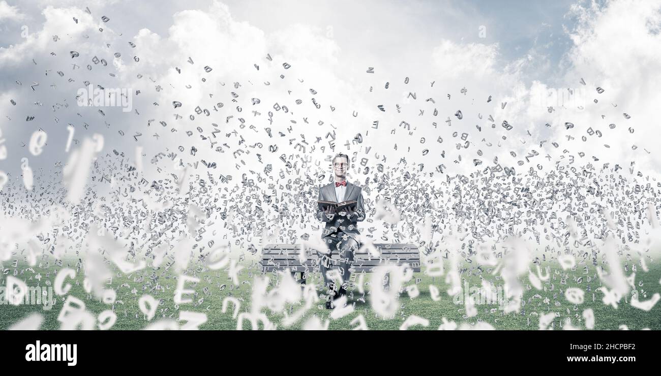 Young businessman or student studying the science and symbols fly ...