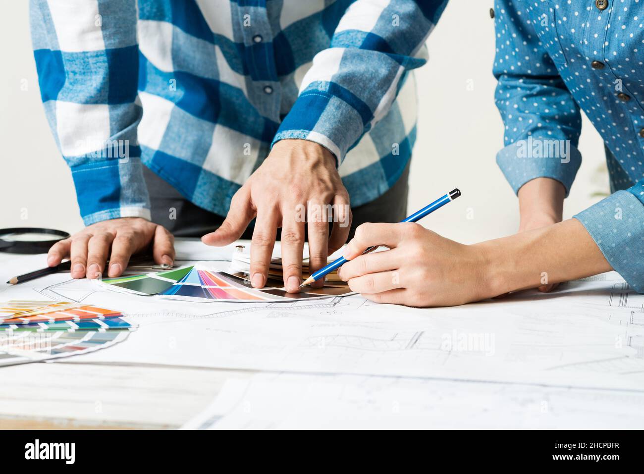 Designers selecting color palette for project Stock Photo - Alamy