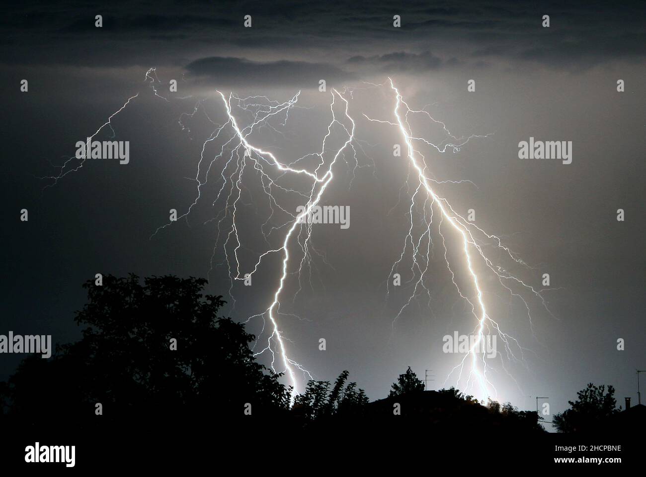 Lightning Strikes During A Thunderstorm Stock Photo Alamy