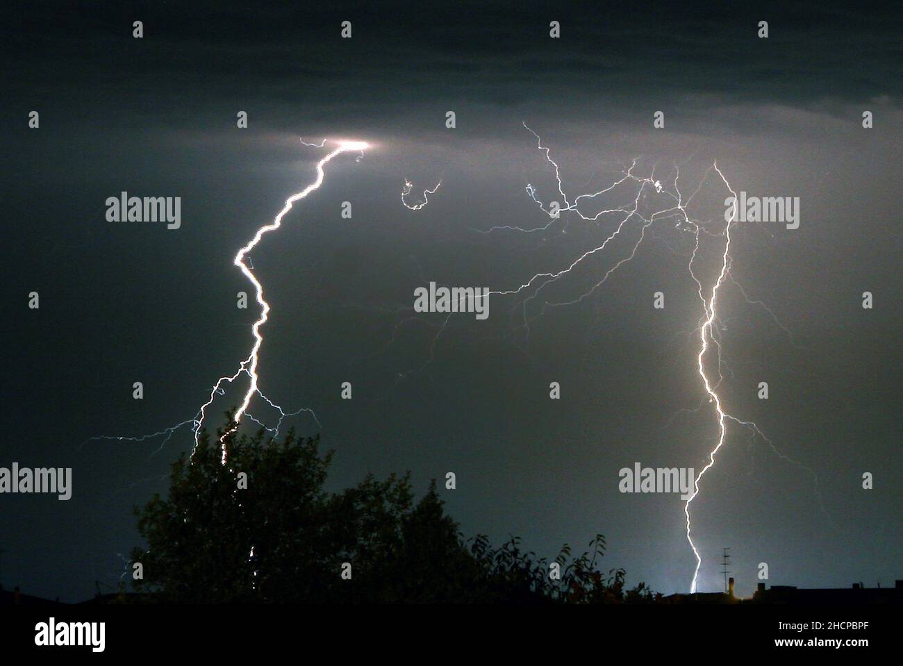 Lightning strikes during a thunderstorm Stock Photo - Alamy