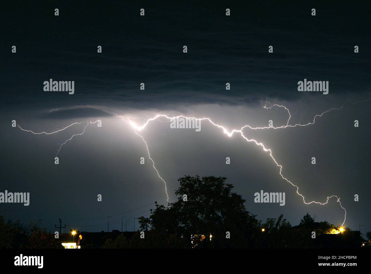 Lightning strikes during a thunderstorm Stock Photo - Alamy